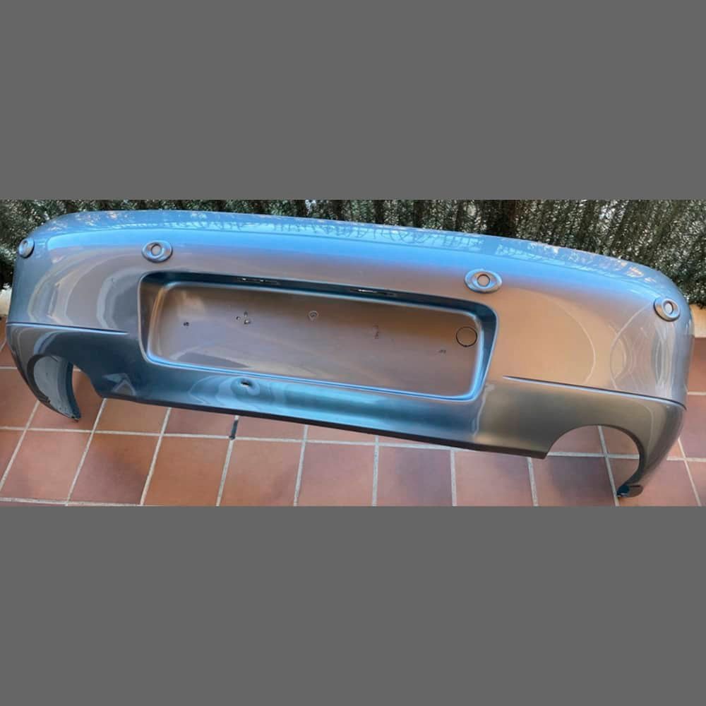Porsche 996 MK1 rear bumper. Grey color.